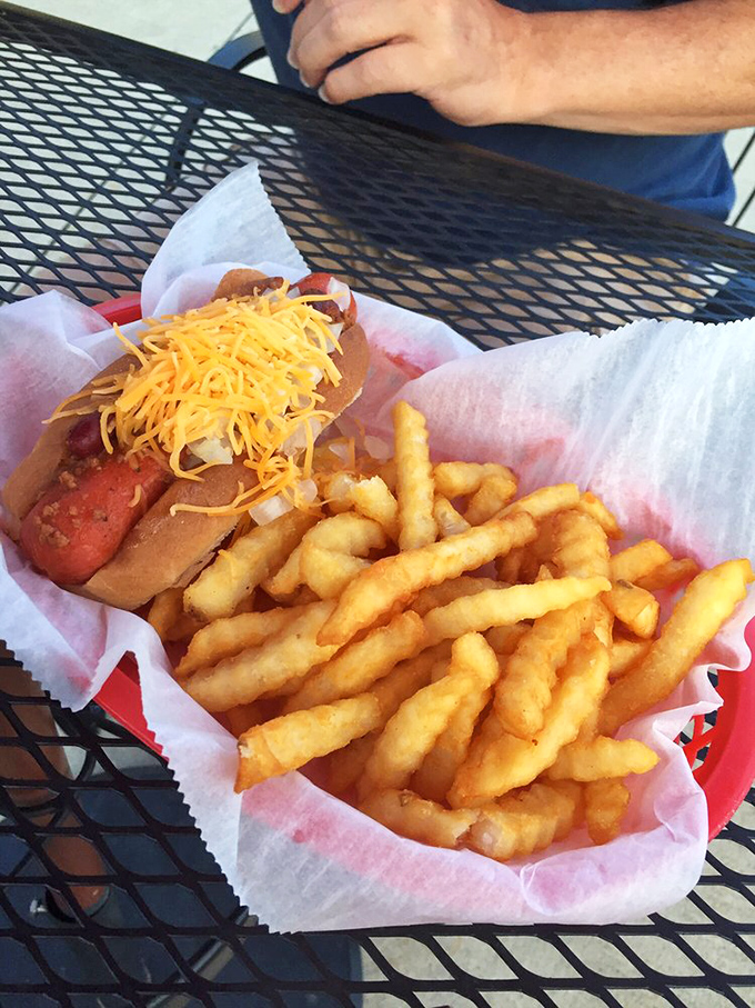 A proper chili dog with crinkle-cut fries—the kind of honest lunch that reminds you why simple food done right is unbeatable.