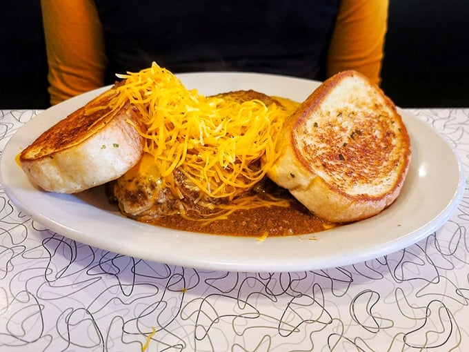 The chili sandwich—where two perfectly grilled pieces of bread barely contain the avalanche of chili and cheese threatening to escape with each bite.