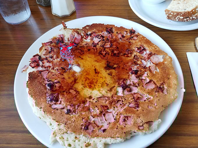 The Chinese Pancake isn't just breakfast—it's edible architecture. A crispy exterior houses savory ham and egg in perfect harmony.