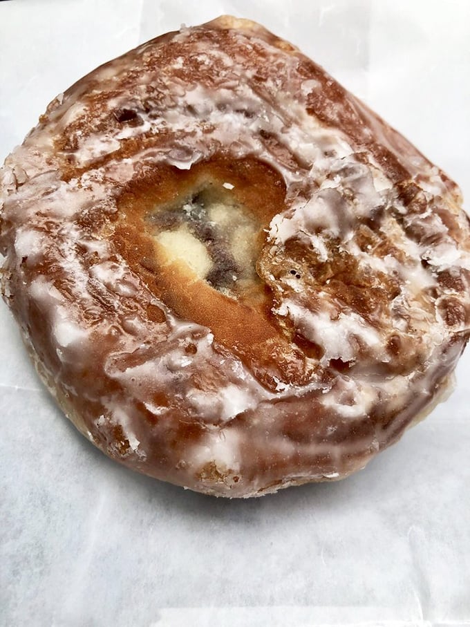 The humble apple fritter—where crispy, caramelized edges meet a tender, cinnamon-spiced interior. Worth every sticky finger that follows.