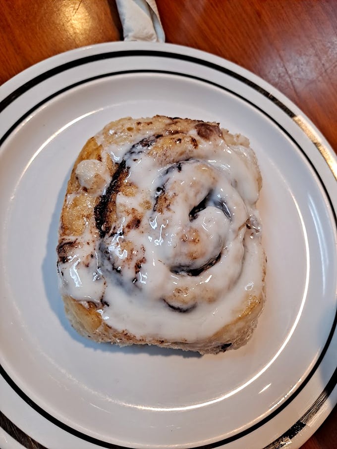 Not all heroes wear capes—some wear icing. This cinnamon roll doesn't need social media filters to look this good.