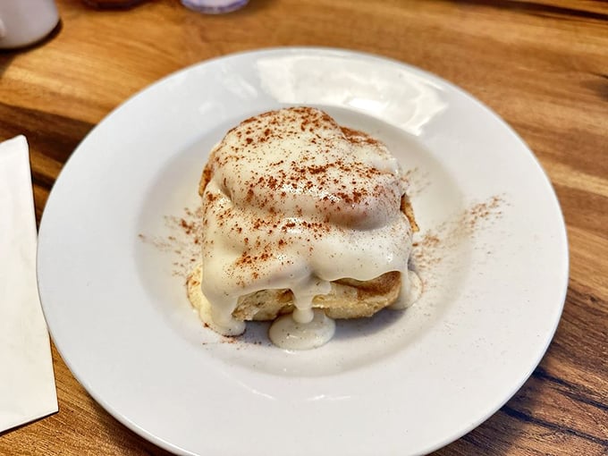 Not just any cinnamon roll – this is what cinnamon rolls dream of becoming when they grow up. Frosting applied with the generosity of a favorite grandma.
