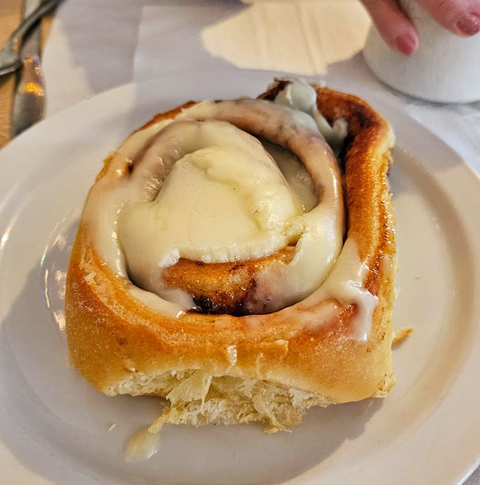 This isn't just a cinnamon roll—it's a warm, gooey love letter to your taste buds with icing that melts into every perfect swirl.