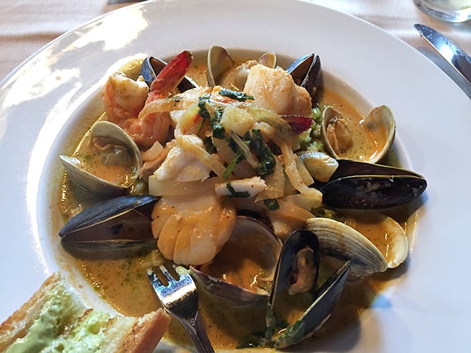This isn't just cioppino—it's an underwater reunion where clams, mussels, and shrimp gather in a flavorful broth that deserves its own fan club.