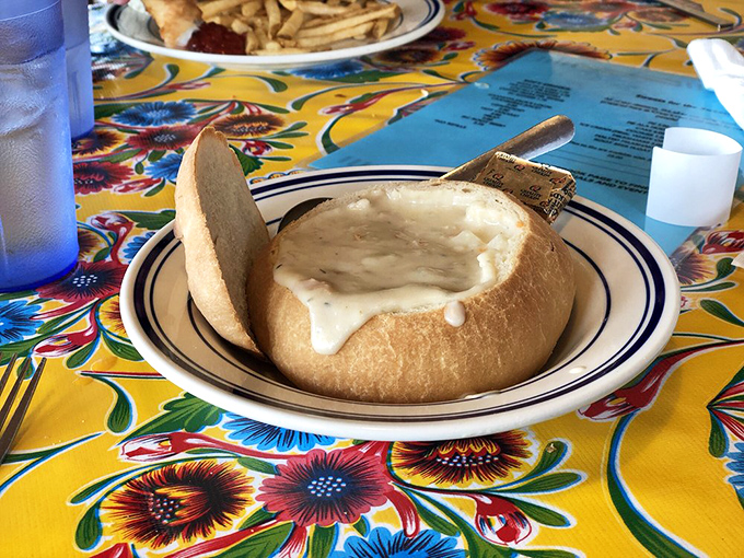 Clam chowder served in a sourdough bread bowl – nature's edible dishware and proof that sometimes the best vessel for soup is more carbs.