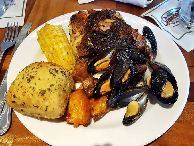 A feast fit for Neptune himself—perfectly roasted chicken, sweet corn, and mussels that taste like they were harvested from the ocean this morning.