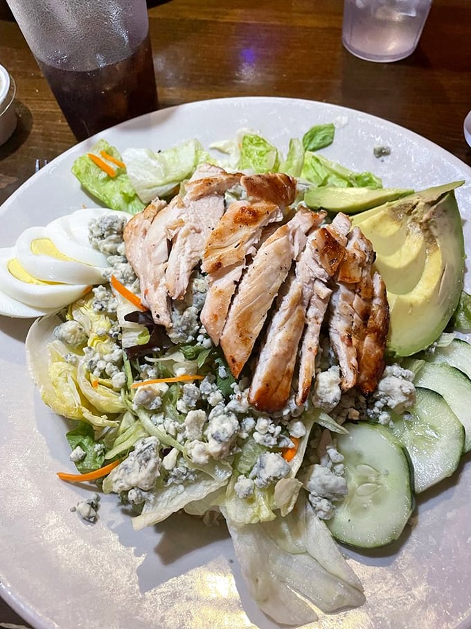 A Cobb salad reimagined with perfectly grilled chicken and avocado—proof that "eating healthy" and "eating happy" can be the same thing.