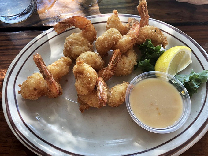 Coconut shrimp that would make even a coconut-skeptic swoon. Crispy, sweet exterior meets plump, juicy shrimp with a dipping sauce that ties it all together.