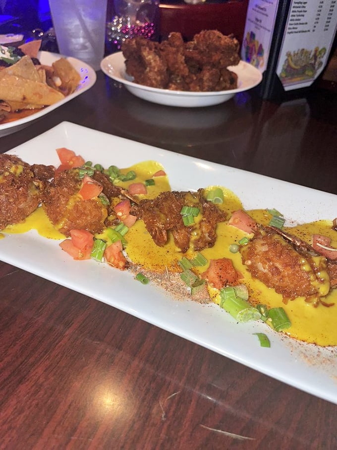 Golden coconut shrimp lounging on a vibrant sauce like sunbathers on a tropical beach. One bite and you're mentally booking a Caribbean getaway.