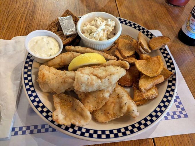 Golden-fried perfection with handcut chips and homemade coleslaw—this isn't just fish, it's Friday night in Wisconsin elevated to an art form.