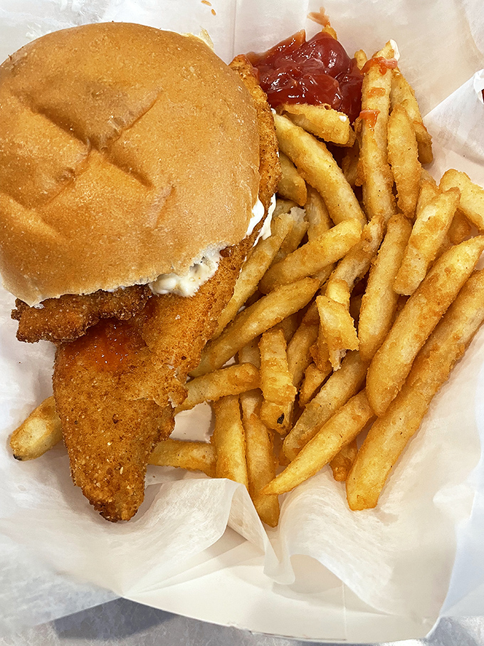 The legendary fish sandwich refuses to be contained by its bun—golden, crispy perfection that's practically a Pittsburgh handshake in edible form.