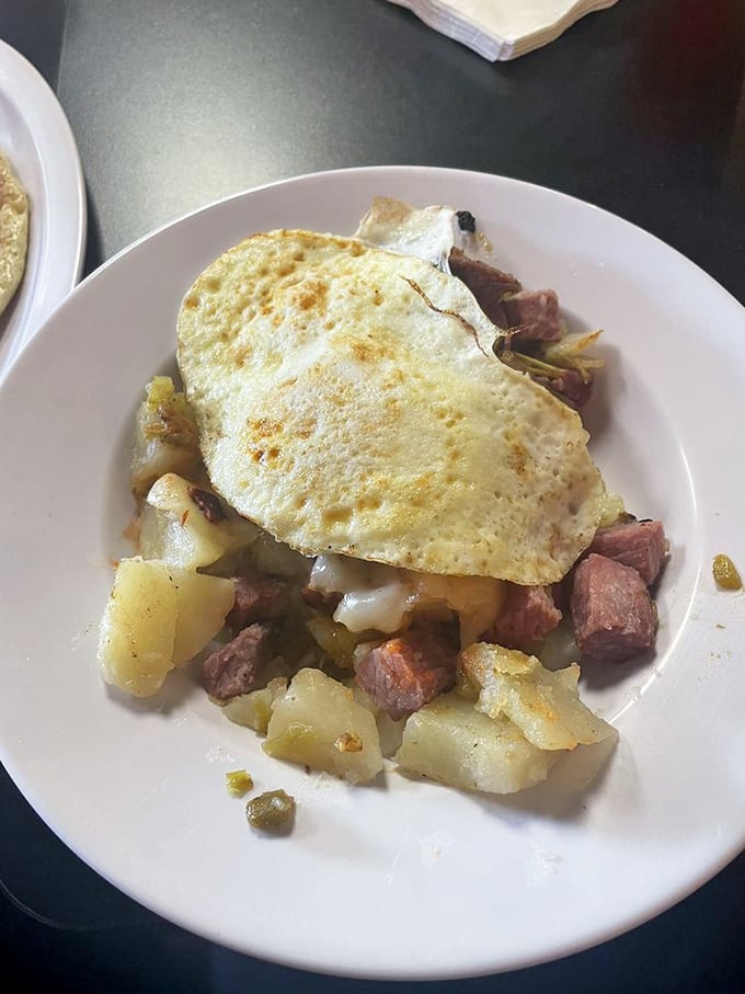 A hearty corned beef hash topped with a sunny-side egg—the breakfast of champions and the cure for whatever ailed you yesterday.