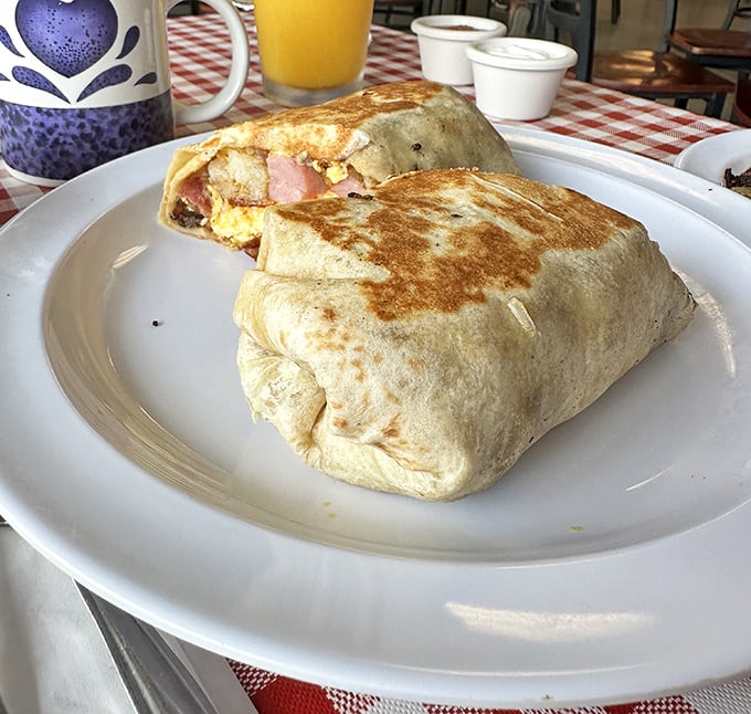 The legendary Country Burrito in all its glory—a perfect marriage of tortilla, eggs, and country sausage that makes you question why you'd eat breakfast any other way.