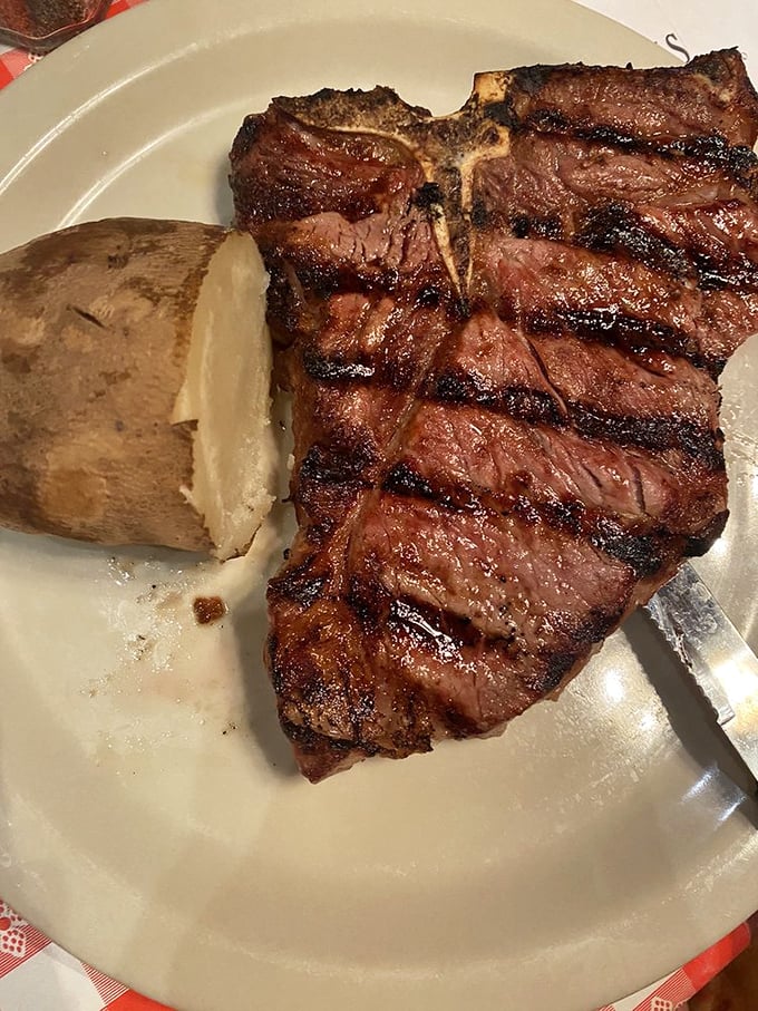 This isn't just a steak—it's a declaration of carnivorous intent. The perfect grill marks tell you these folks mean serious business.
