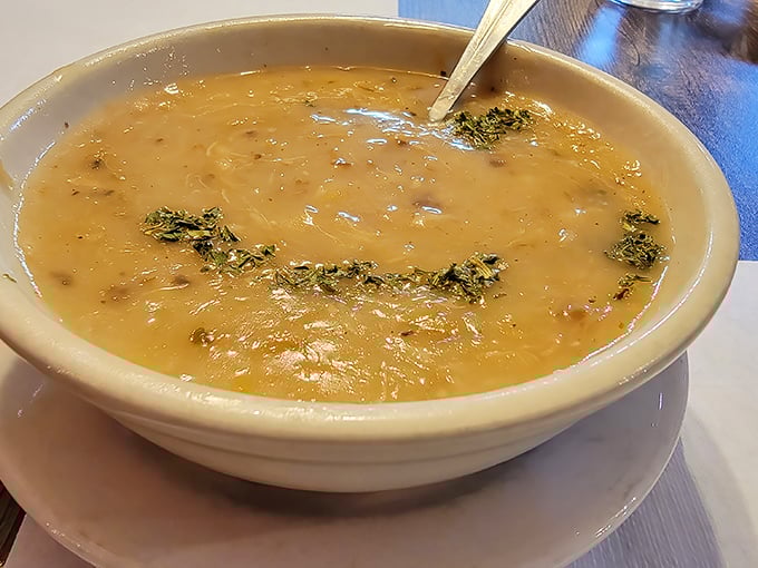 This crab bisque isn't just soup—it's a warm hug in a bowl. The herbs floating on top aren't just for show; they're little flavor ambassadors.