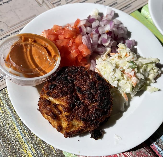 The perfect crab cake doesn't exi— wait, there it is! Golden-crisp exterior giving way to sweet, jumbo lump meat that needs no introduction.