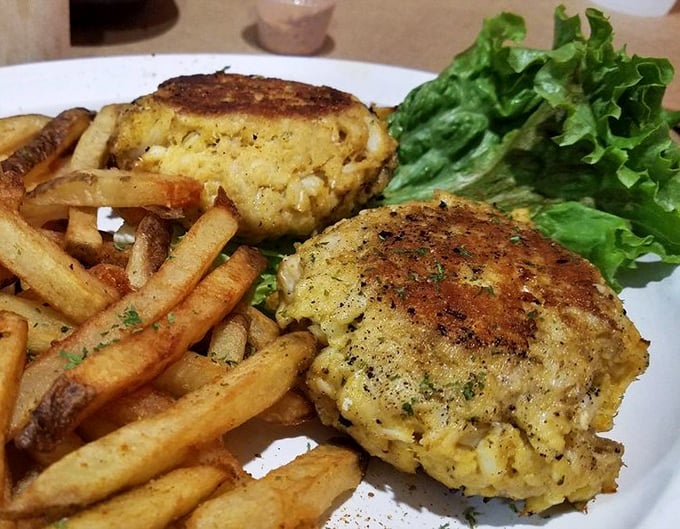 These golden-brown crab cakes are what Maryland dreams are made of—mostly crab, minimal filler, and cooked until the edges achieve that perfect crispy halo.