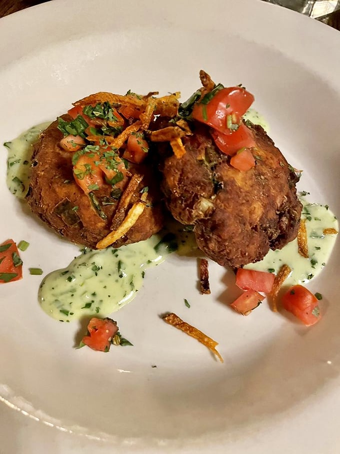 These crab cakes aren't playing games. No fillers, no distractions, just sweet crab meat transformed into golden-brown pucks of pure joy.