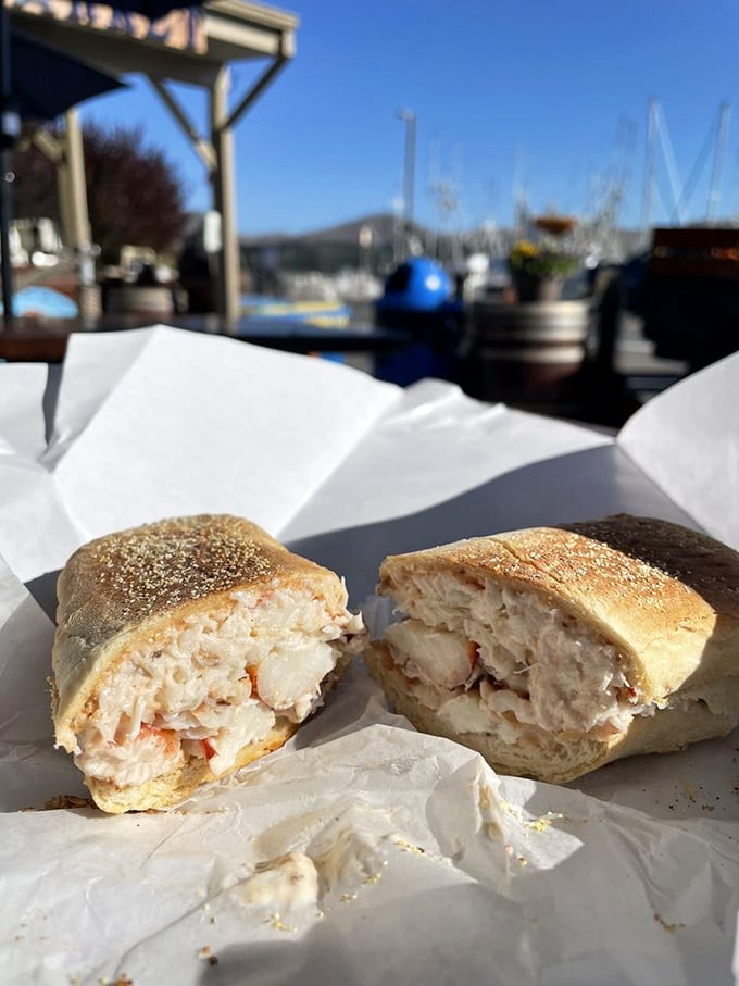 Crab sandwich perfection—where chunks of sweet meat nestled in a toasted roll make you question every other sandwich decision you've ever made.