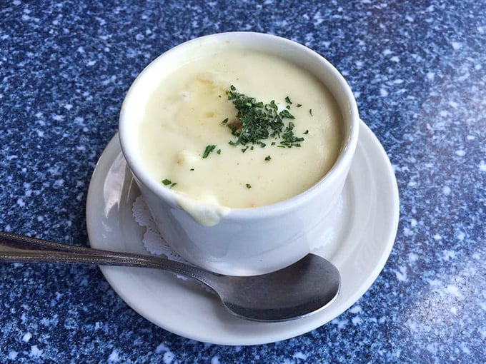 Cream of crab soup so velvety it should come with its own runway. This bowl contains more treasures than most pirate chests.