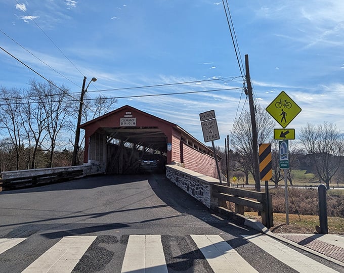 Approaching Wehr Bridge feels like stepping into a Norman Rockwell painting—complete with pedestrian crossing and enough warning signs to satisfy even the most cautious grandmother.