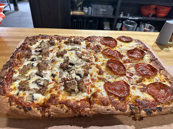 The Sicilian square pizza – architectural marvel of dough engineering with a foundation sturdy enough to support those magnificent toppings.