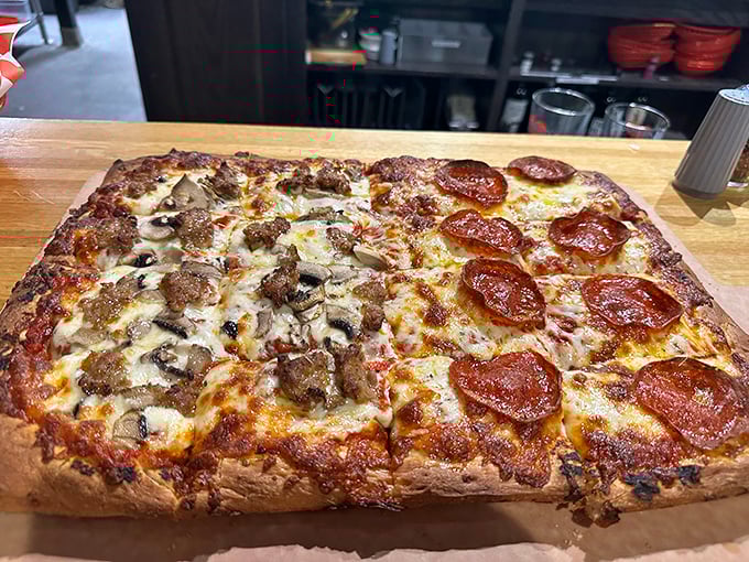 The Sicilian square pizza – architectural marvel of dough engineering with a foundation sturdy enough to support those magnificent toppings.