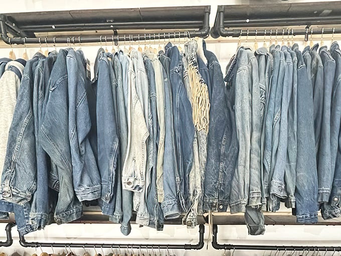 The denim section – a sea of blue possibilities where every shade tells a different story of American fashion through the decades.