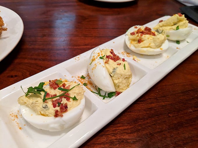 These deviled eggs aren't your grandmother's picnic standard – they're dressed up with bacon and herbs, ready for their close-up on your Instagram feed.