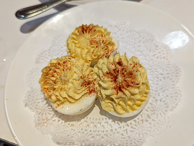 Deviled eggs dressed for success with paprika stars. These aren't your standard potluck appetizers—they're little works of edible art.