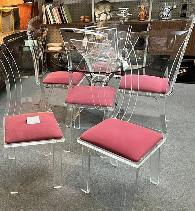 Lucite dining chairs that would make The Jetsons jealous. Mid-century modern at its finest – transparent yet somehow substantial.