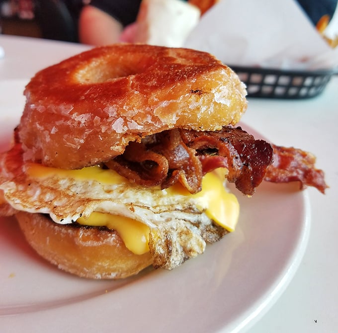 The donut sandwich laughs in the face of conventional breakfast boundaries. Part sweet, part savory, all delicious—like breakfast and dessert had a beautiful baby. 