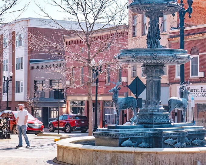 That ornate fountain isn't just decorative – it's a testament to an era when public spaces were designed with both beauty and community gathering in mind.