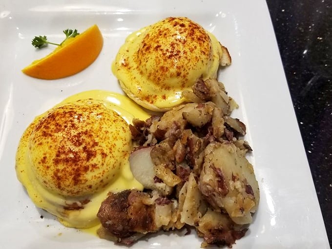 Eggs Benedict done right, with hollandaise that flows like liquid sunshine and perfectly poached perfection underneath.