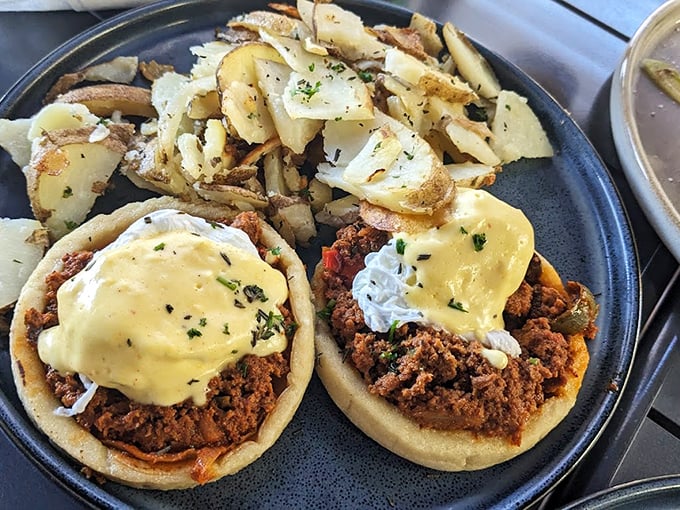 These aren't your standard English muffins—Vovomeena's take on Eggs Benedict features savory corn cakes topped with chorizo and hollandaise that dreams are made of.