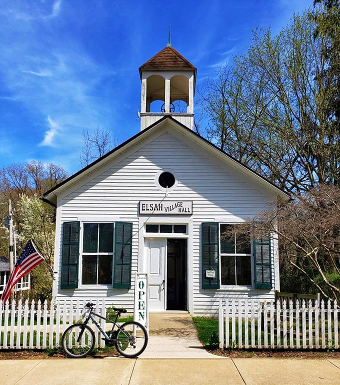 The Elsah Village Hall isn't just adorable – it's the quintessential American small-town gathering place, complete with white picket fence and enough charm to fill a Norman Rockwell painting.
