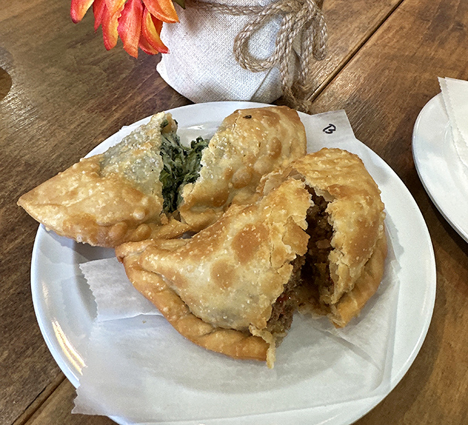 These empanadas aren't just golden-brown – they're treasure chests of flavor waiting to be cracked open by hungry explorers.