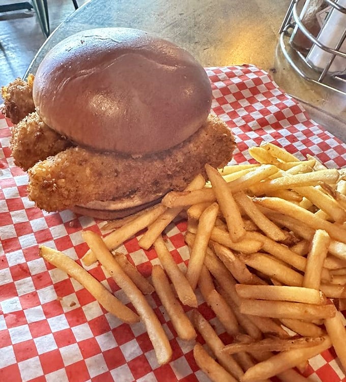 The fish sandwich defies fast-food expectations—crispy, golden perfection that would make any seafood lover abandon their diet plans.