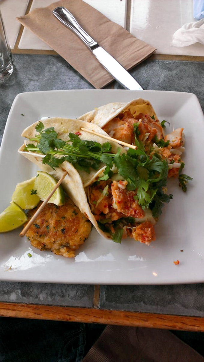 Fish tacos that deserve their own parade—fresh catch nestled in warm tortillas with vibrant cilantro and lime that transport you to coastal bliss with every bite.
