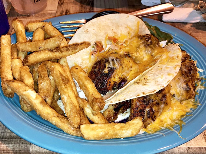"Fish tacos that make you wonder why you'd ever eat anything else – crispy, cheesy, and demanding to be devoured immediately."