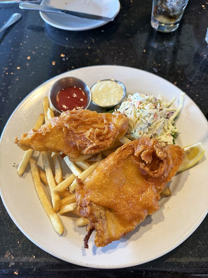 Golden, crispy, and utterly irresistible—this fish and chips plate makes you wonder if you've ever truly experienced the dish before this moment.