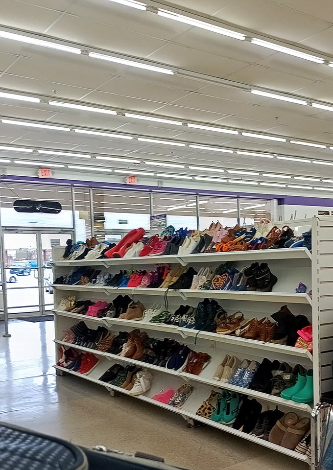 The shoe wall—a colorful mosaic of footwear possibilities. Someone's "too tight" becomes your "just right" in this pedestrian paradise.