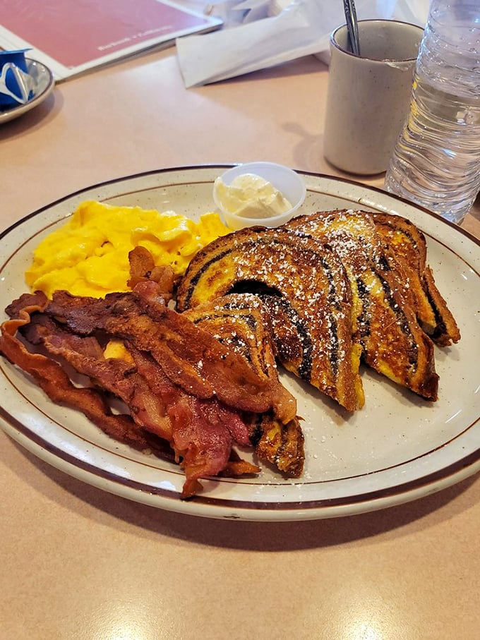 French toast with the perfect griddle marks—like tiger stripes if tigers were delicious and came with perfectly crispy bacon.