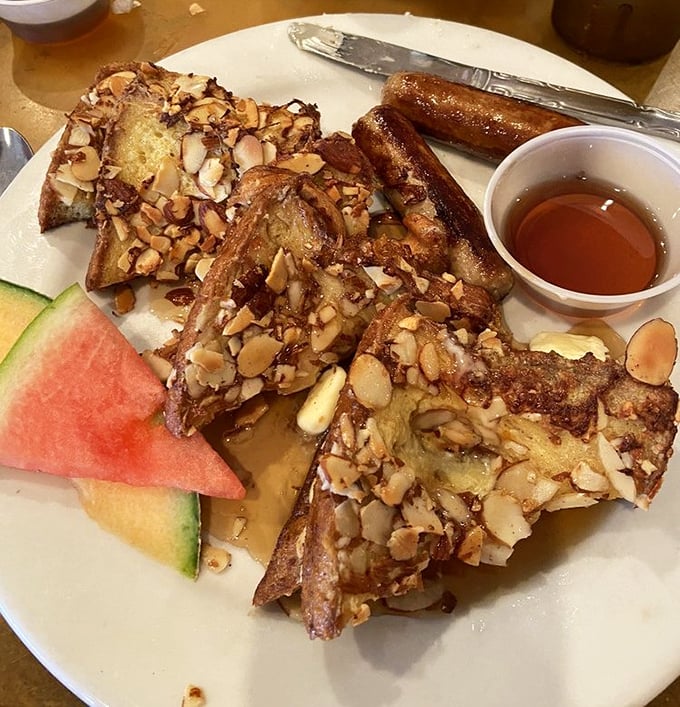 French toast that doesn't just flirt with perfection—it's in a committed relationship. Those toasted almonds add the crunch your breakfast deserves.