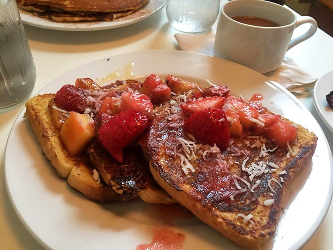 This isn't just French toast—it's a berry-crowned masterpiece that makes you wonder why we don't eat breakfast for every meal.