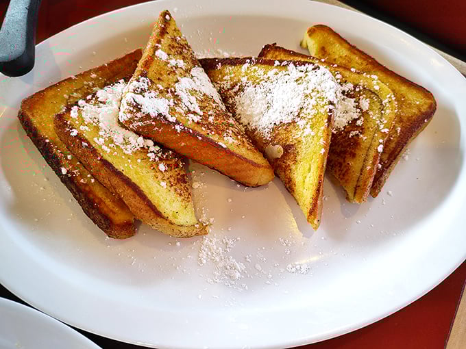 French toast that's achieved the perfect golden-brown exterior while maintaining that custard-like center – the breakfast equivalent of winning the lottery.