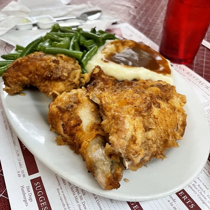 Fried chicken that makes Colonel Sanders look like an amateur. Paired with green beans that didn't come from a can—hallelujah!