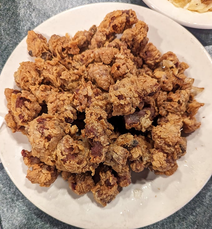 These aren't your average chicken livers—they're little nuggets of culinary courage, crispy outside and creamy within, waiting to convert the skeptical one bite at a time.
