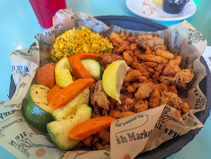 Fried seafood perfection served with vegetables that actually taste good. Someone in that kitchen understands the balance of indulgence and virtue.