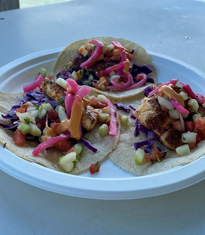 These mahi tacos aren't just colorful—they're a fiesta of textures and flavors that might make you consider moving to the Keys permanently.
